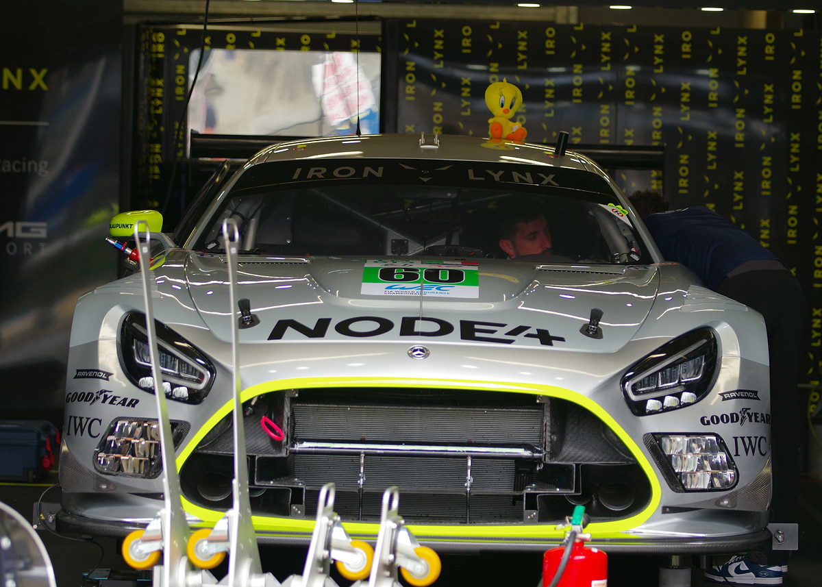 'Iron Lynx Racing Car in Garage' Poster, picture, metal print, paint by ...