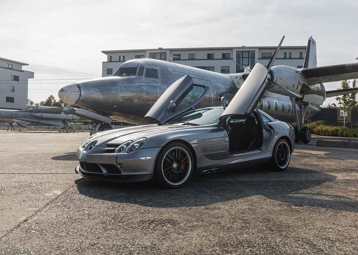 'Silver Mercedes-Benz SLR McLaren with Airplane' Poster, picture, metal ...