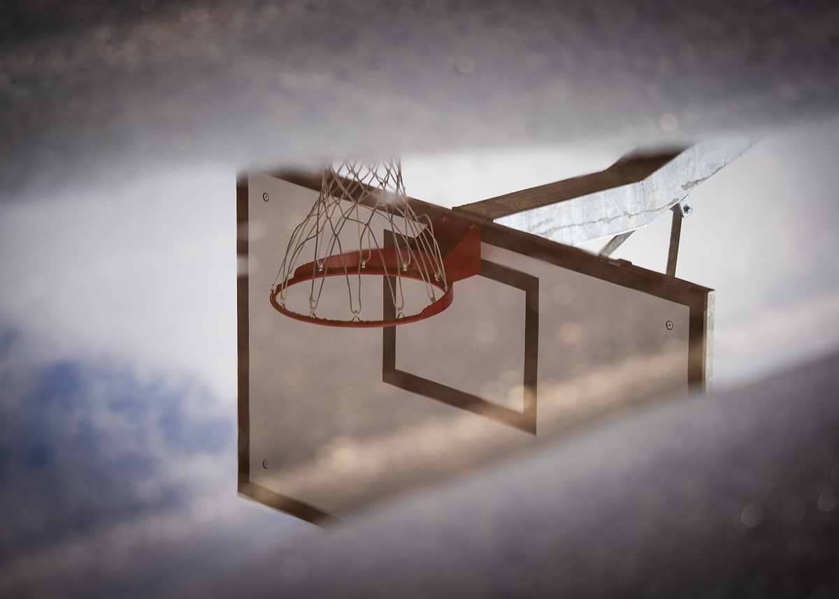 'Basketball hoop reflection in puddle' Poster, picture, metal print ...