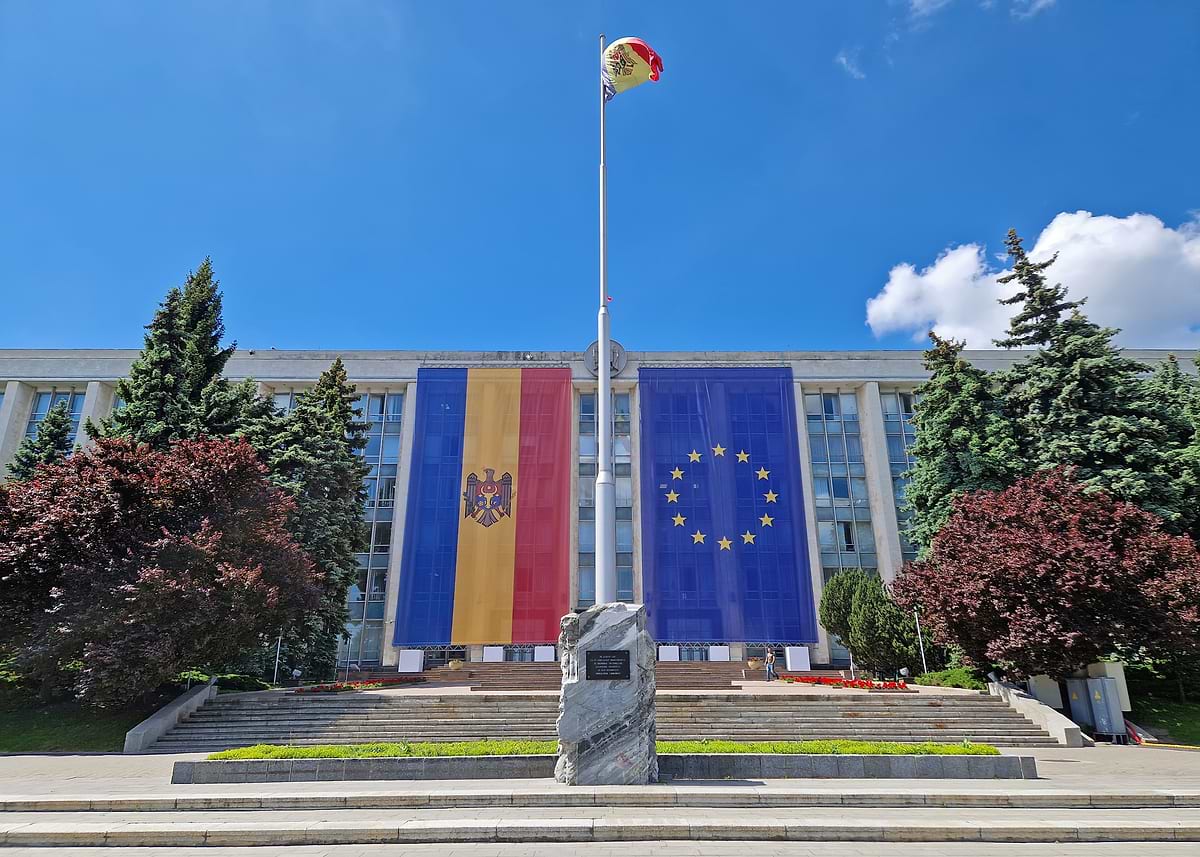 'Moldovan and EU flags on building' Poster, picture, metal print, paint ...