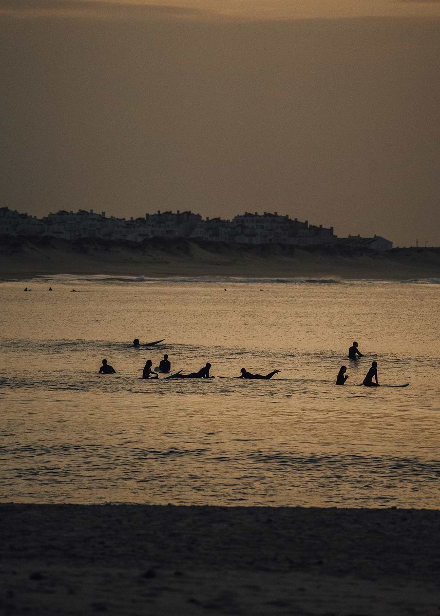 'Silhouettes of Surfers at Sunset in Baleal Portugal OU' Poster ...