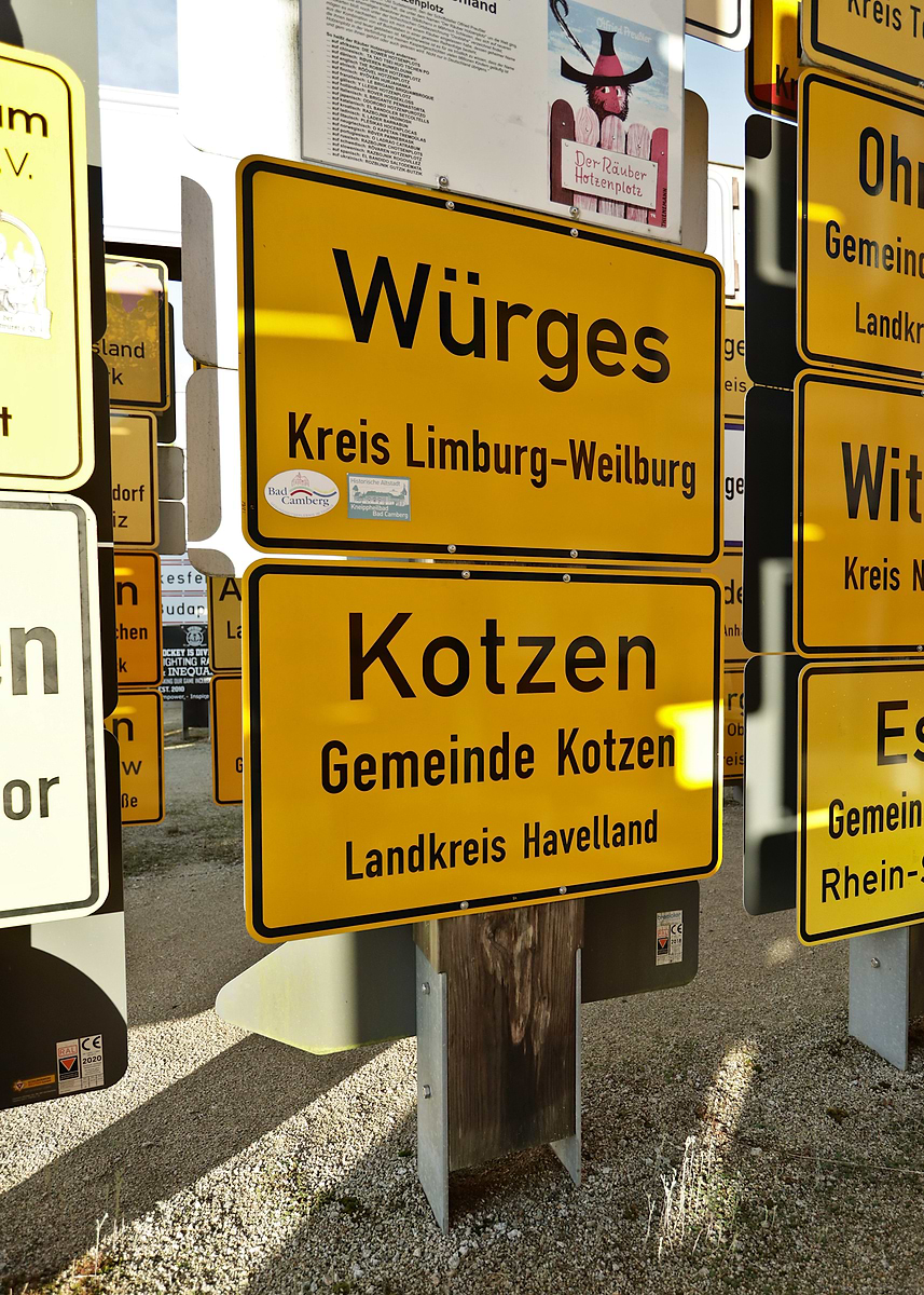 'German town signs: Würges and Kotzen' Poster, picture, metal print ...