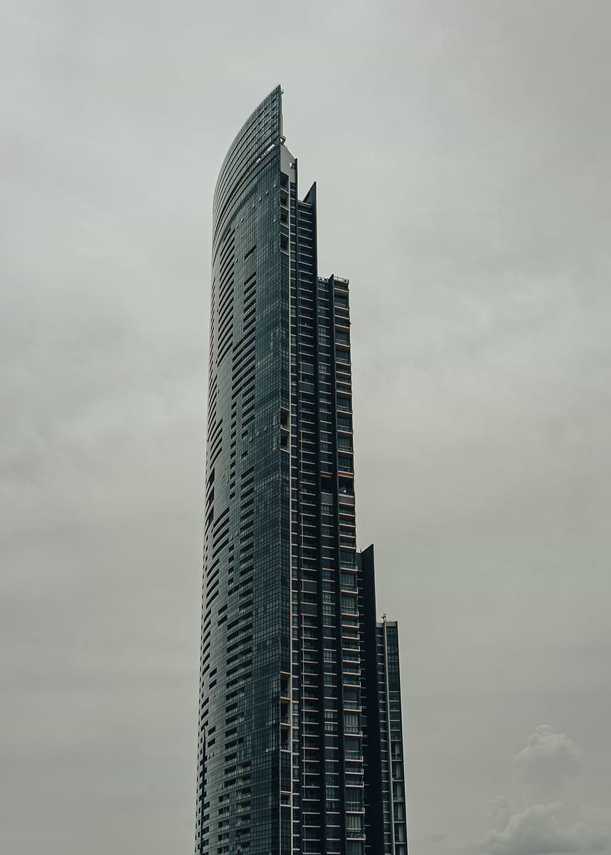 'Modern Skyscraper Against Overcast Sky' Poster, picture, metal print ...