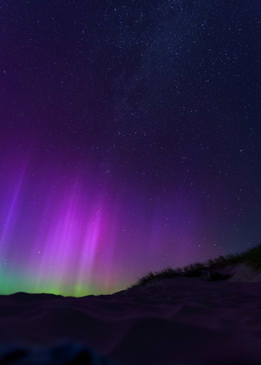 'Aurora Borealis over Amrum, Germany with a starry sky in the ...
